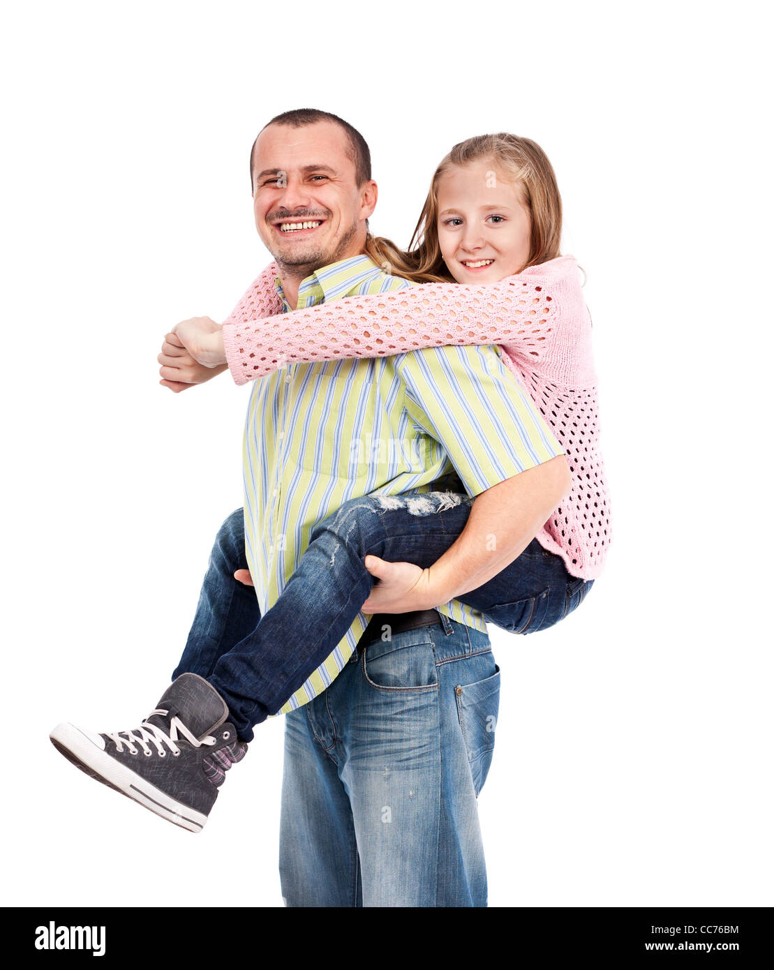Father giving his daughter a piggyback ride, isolated on white ...