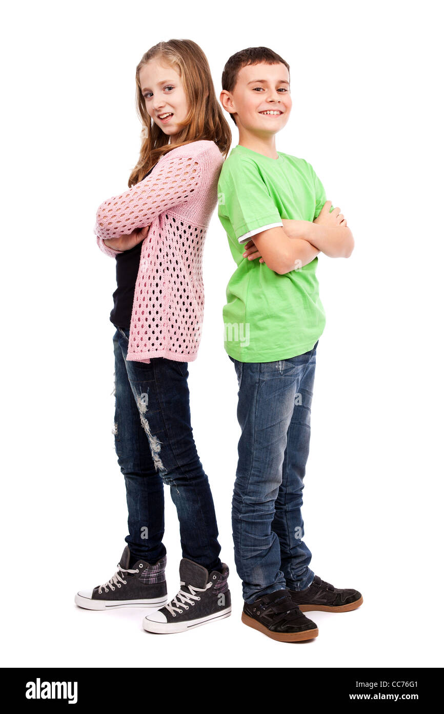 Two children back to back isolated on white background Stock Photo - Alamy