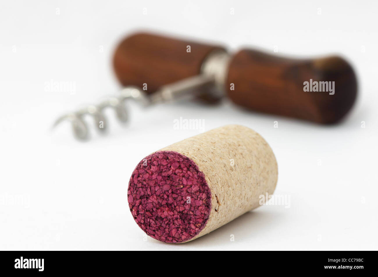 Corkscrew and cork white isolated Stock Photo - Alamy