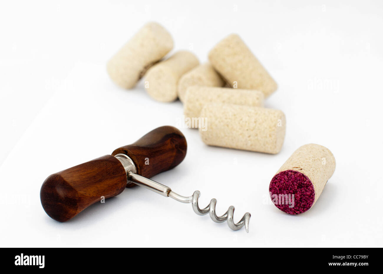 Corkscrew and cork white isolated Stock Photo - Alamy