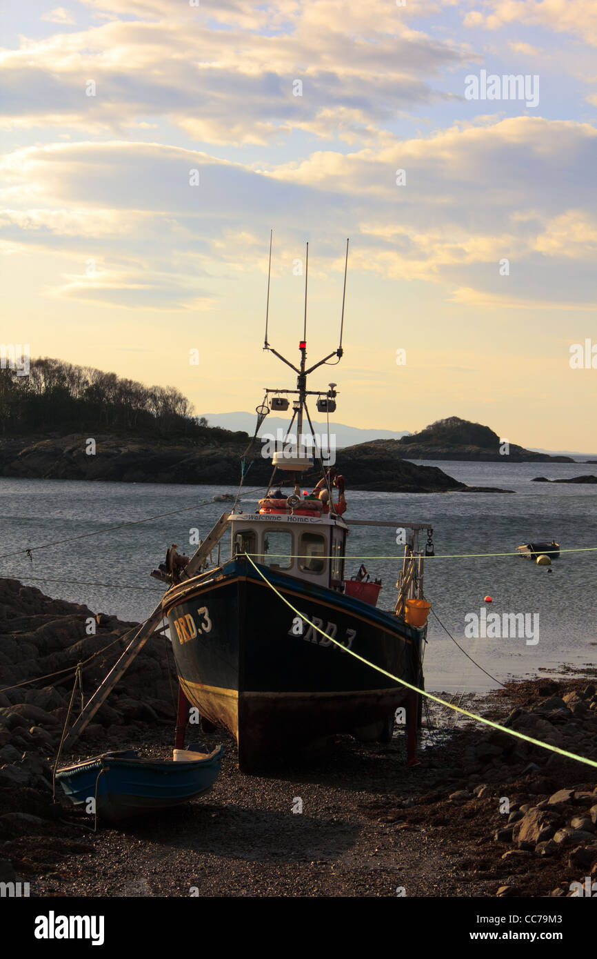 fishing boat lying in scottish highlands Stock Photo - Alamy