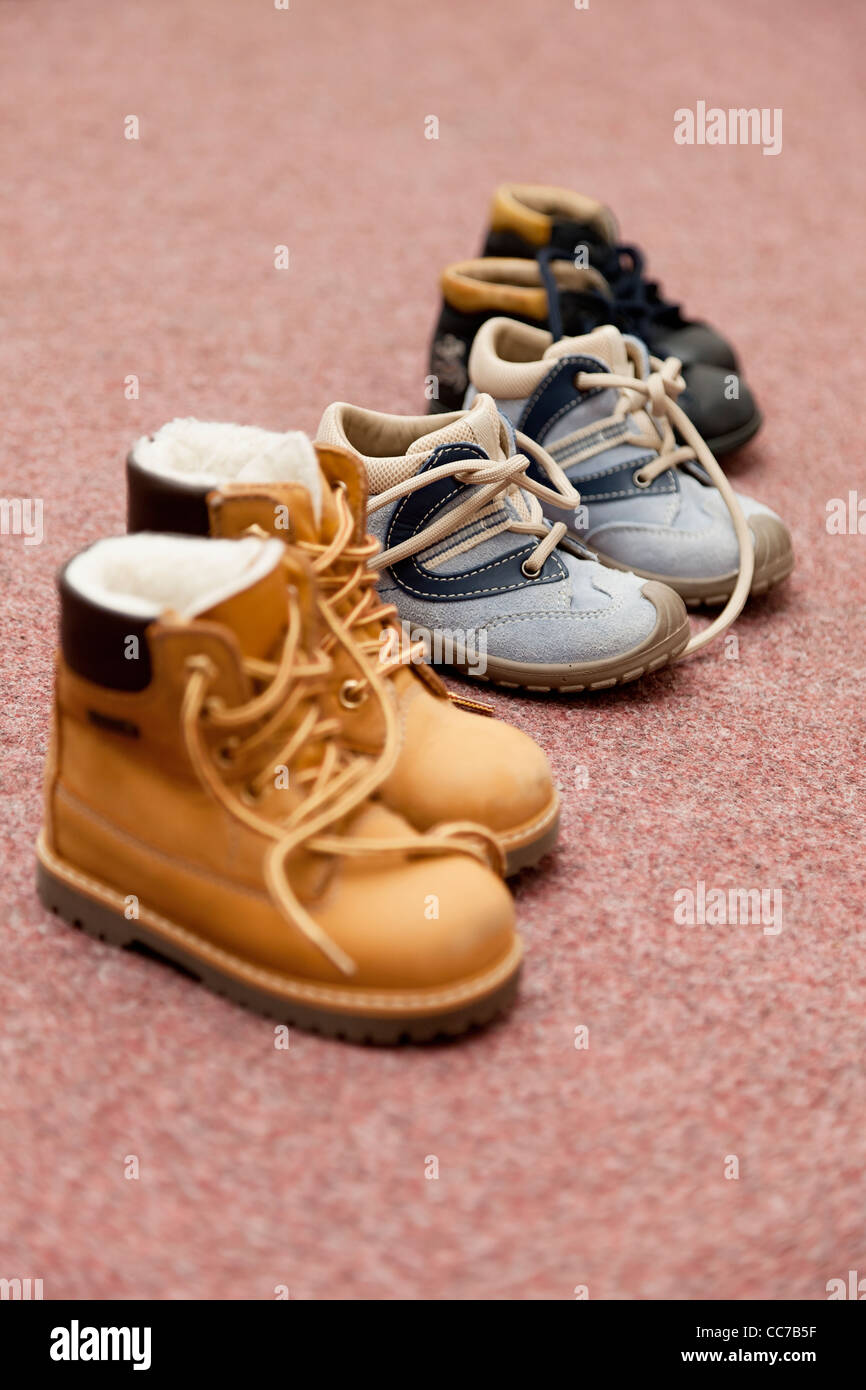Various Childrens Shoes In A Row Stock Photo Alamy various-childrens-shoes-in-a-row-stock-photo-alamy