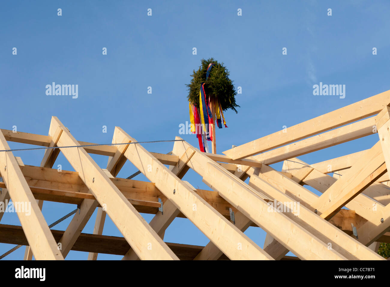 Topping-out wreath on a newly constructed house Stock Photo - Alamy