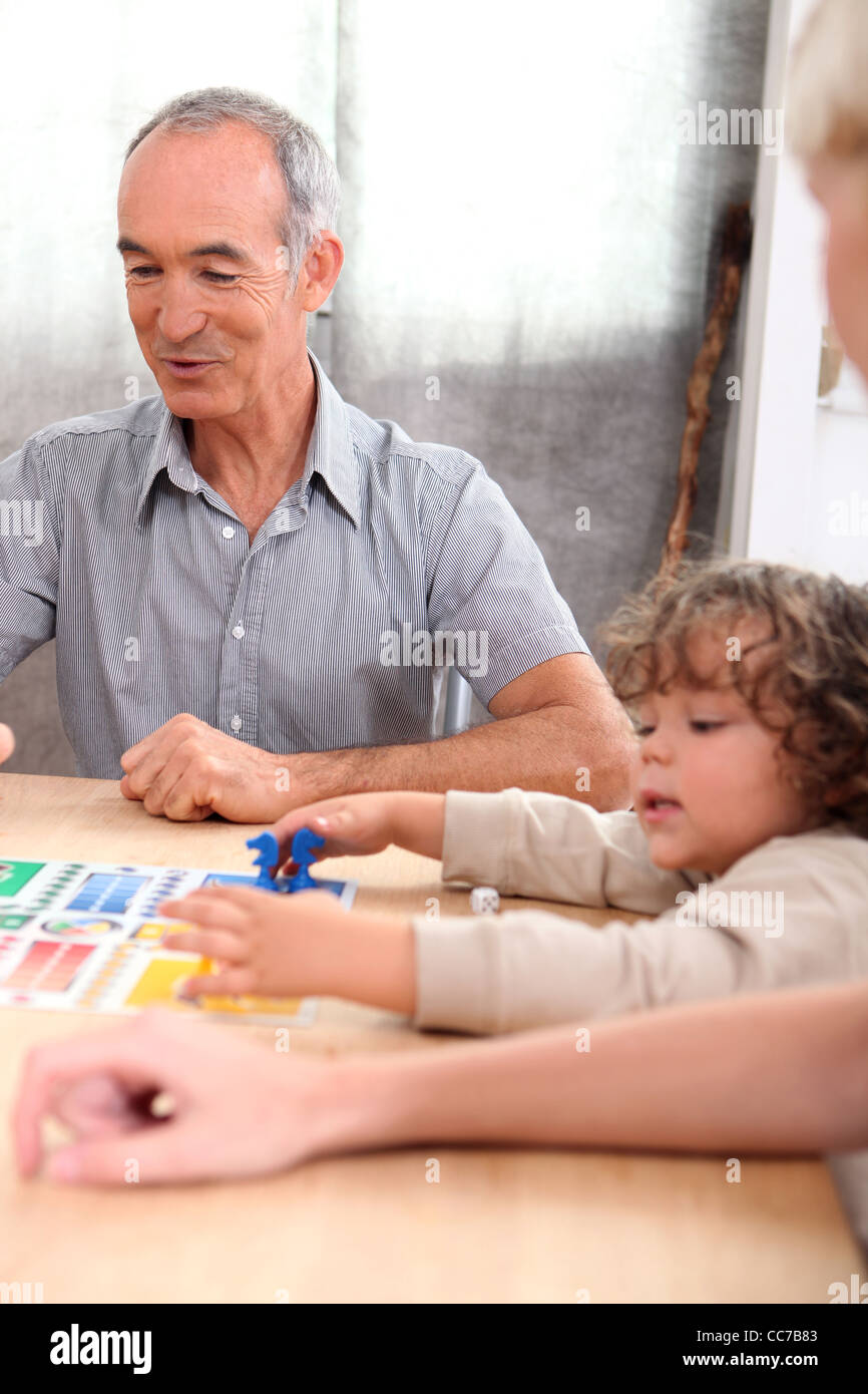 grandfather playing with his grandson Stock Photo - Alamy
