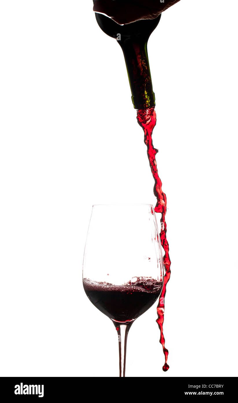 Red wine being poured into wineglass hi-res stock photography and ...