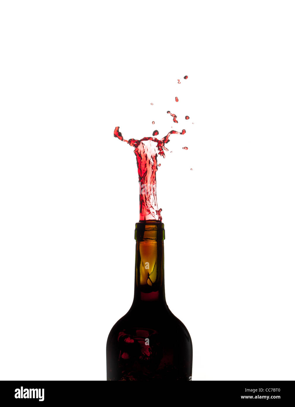 Red wine being poured directly upwards from bottle Stock Photo - Alamy