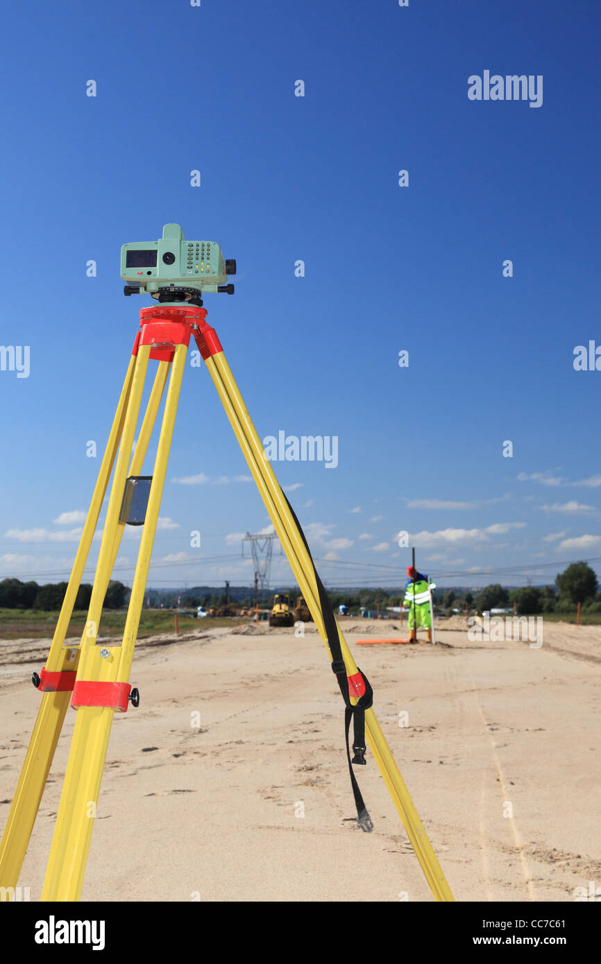 Builder's level - construction site by theodolite level transit ...