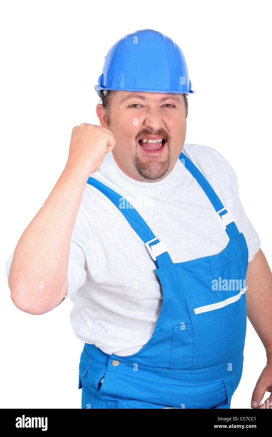 Happy male builder Stock Photo - Alamy