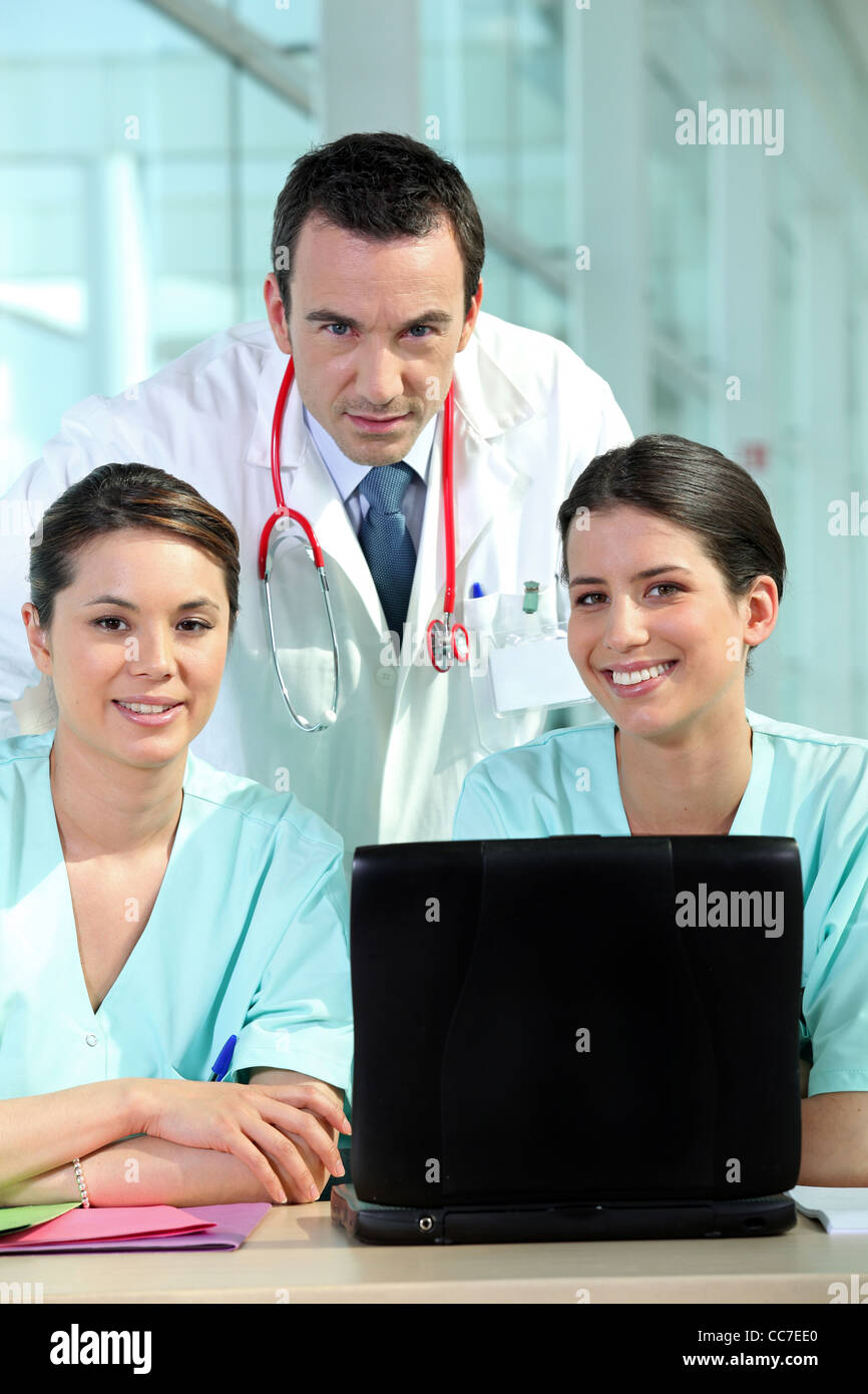 doctor and two nurses in a hospital Stock Photo - Alamy