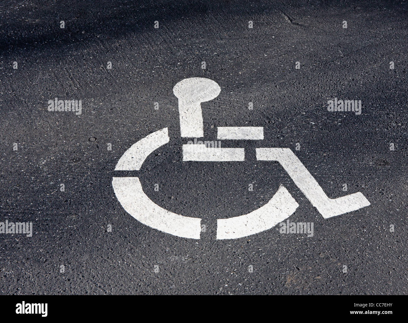 symbol denoting handicapped parking lot space Stock Photo - Alamy