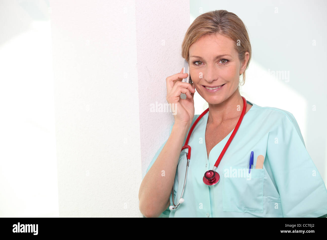 Nurse on the phone Stock Photo - Alamy