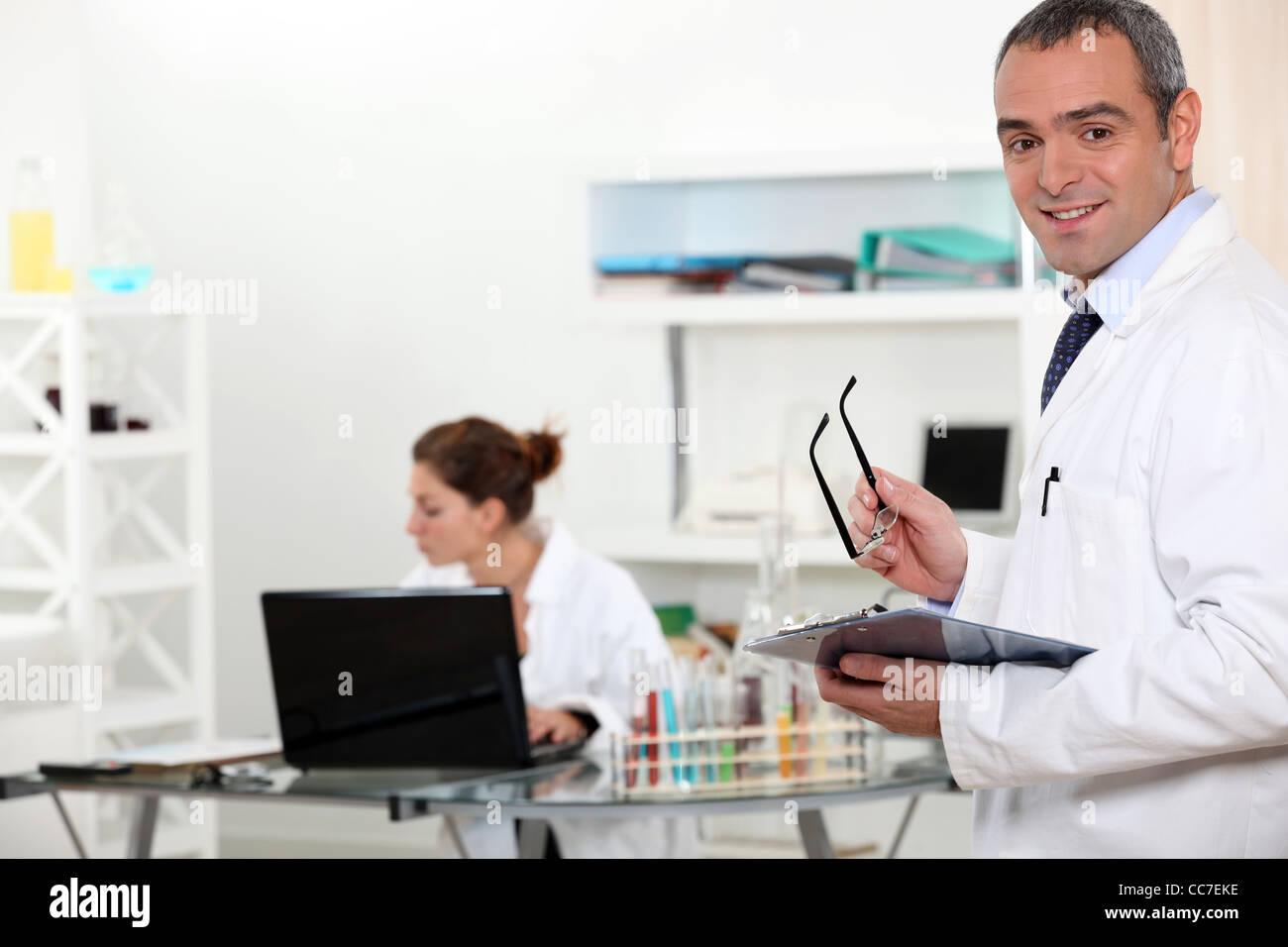 A team of researchers working in a laboratory Stock Photo - Alamy