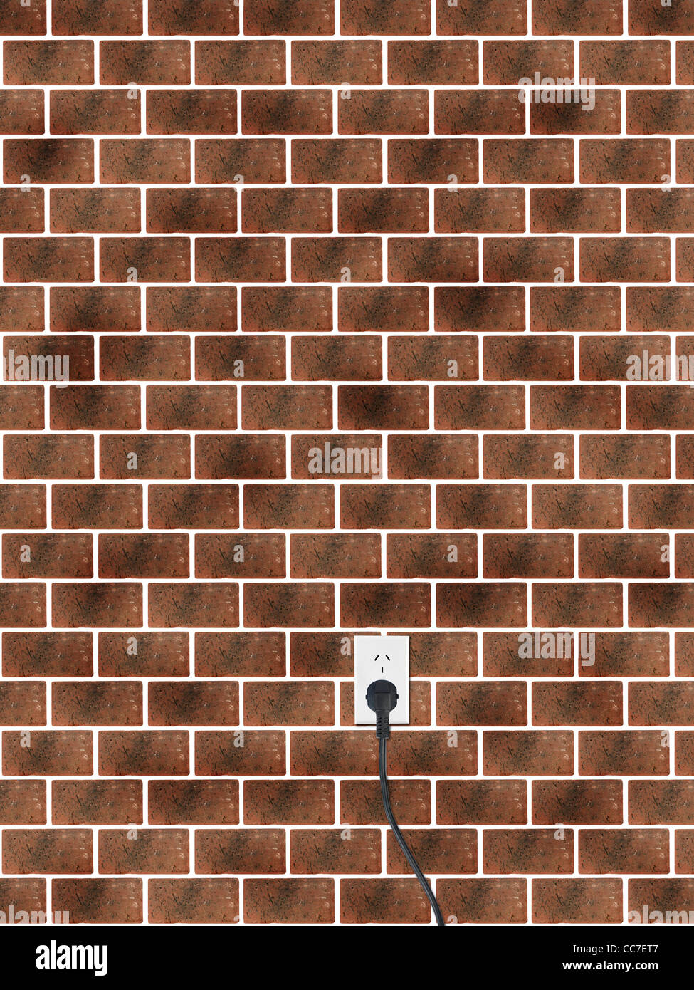 A power cord and outlet on a brick wall Stock Photo - Alamy