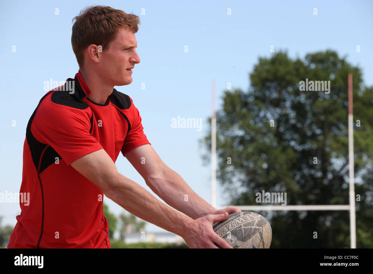 Rugby match player kicking ball hi-res stock photography and images - Alamy