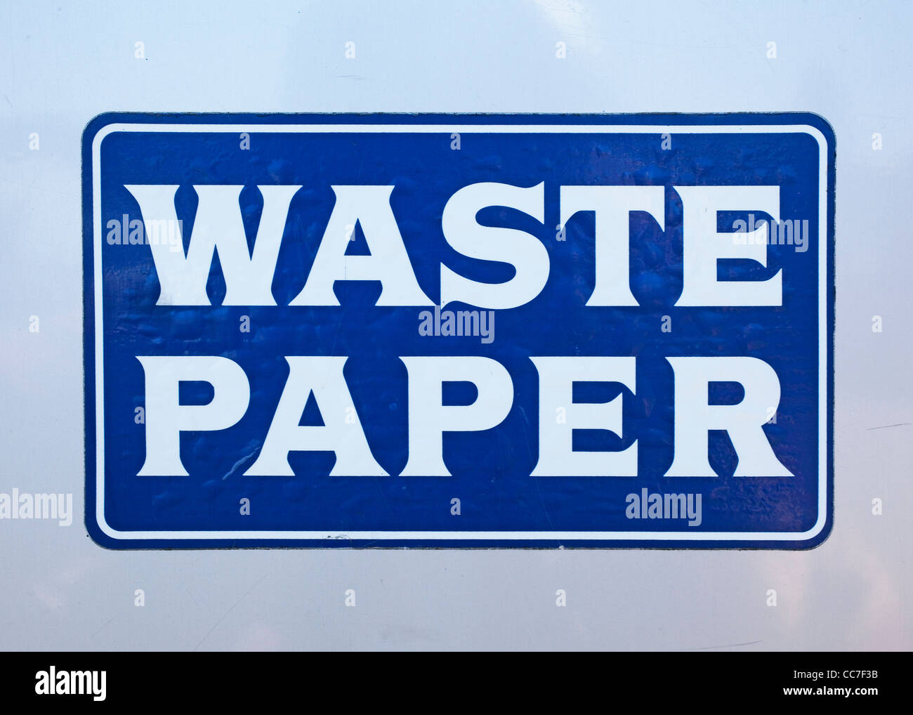 waste paper sign mounted to trash receptacle Stock Photo - Alamy