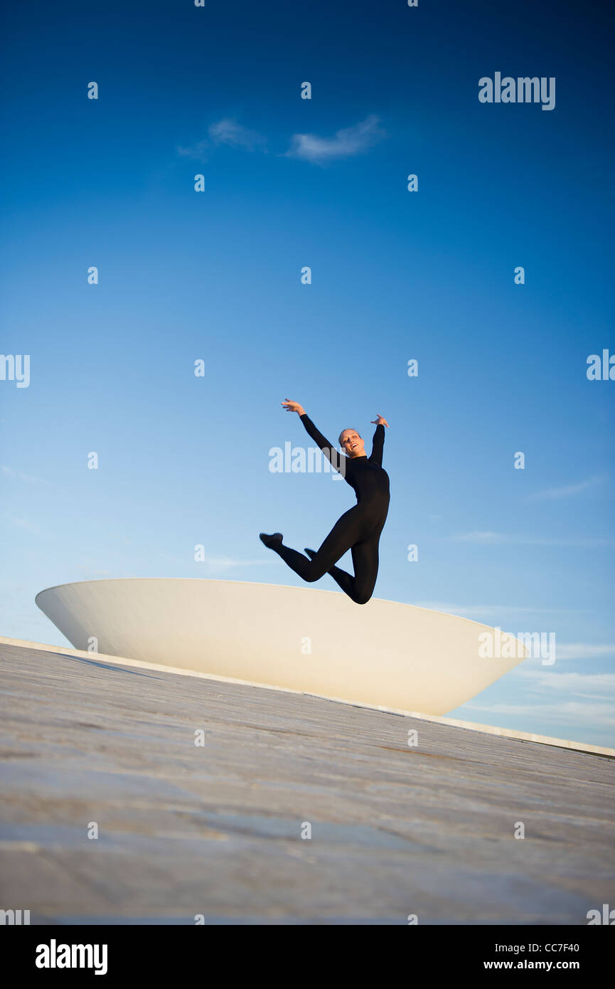 Brazilian dancer jumping in mid-air outdoors Stock Photo - Alamy