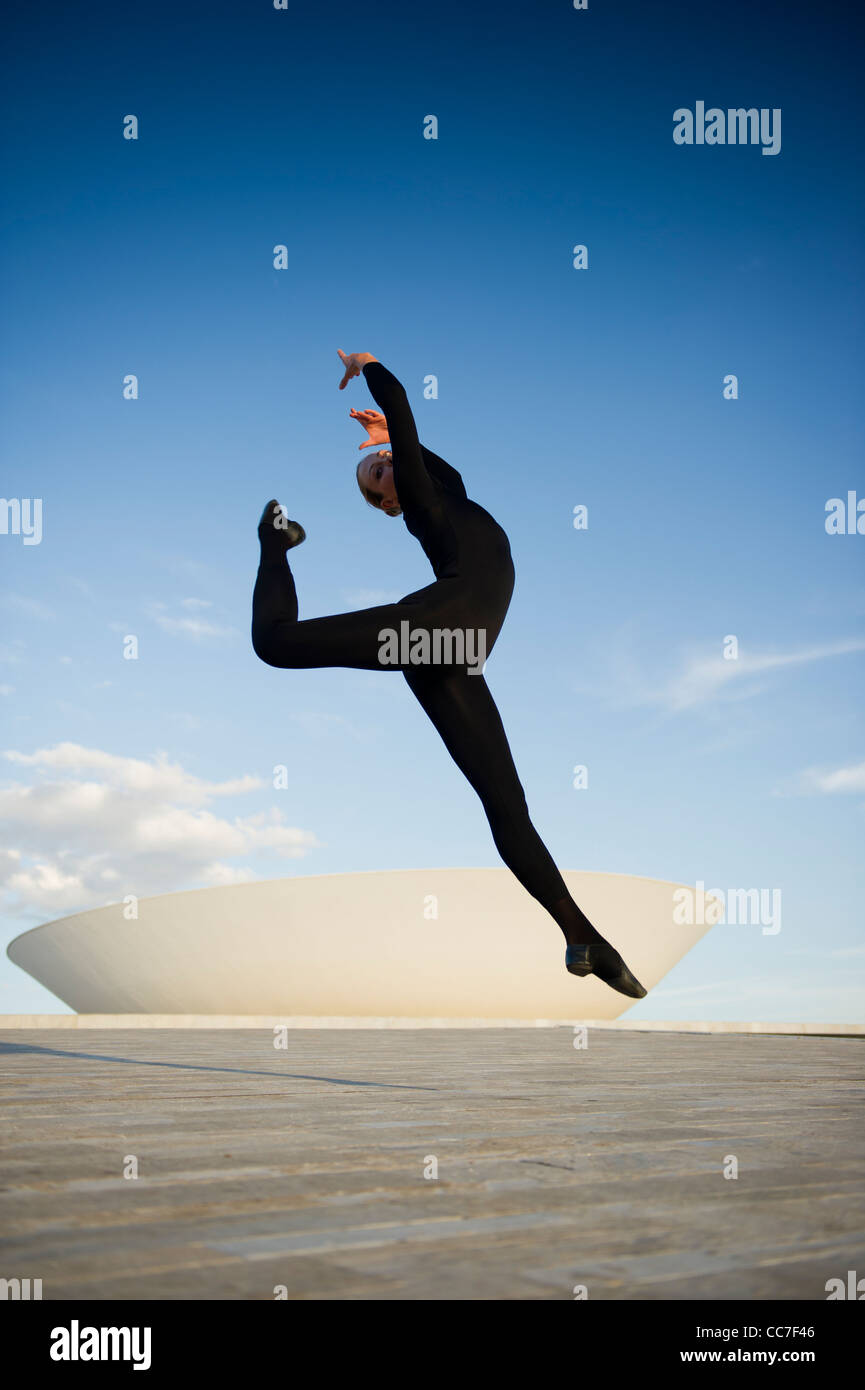 Brazilian dancer jumping in mid-air outdoors Stock Photo - Alamy