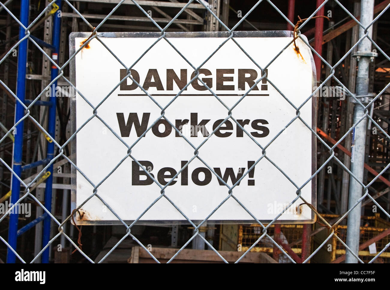 danger sign posted on chain link fence Stock Photo - Alamy