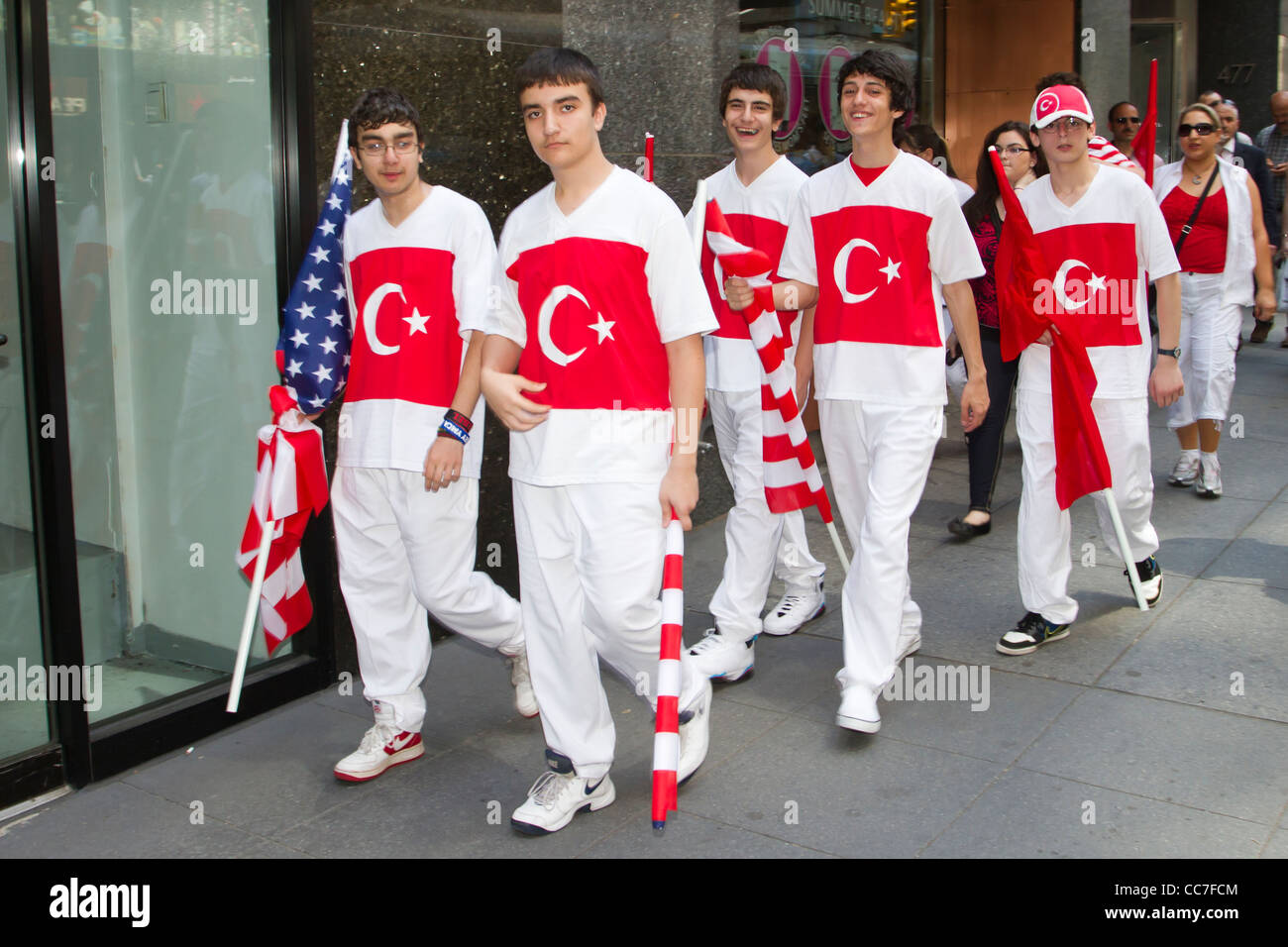 Marchers in the 2011 Turkish Day parade head to the start of the parade ...