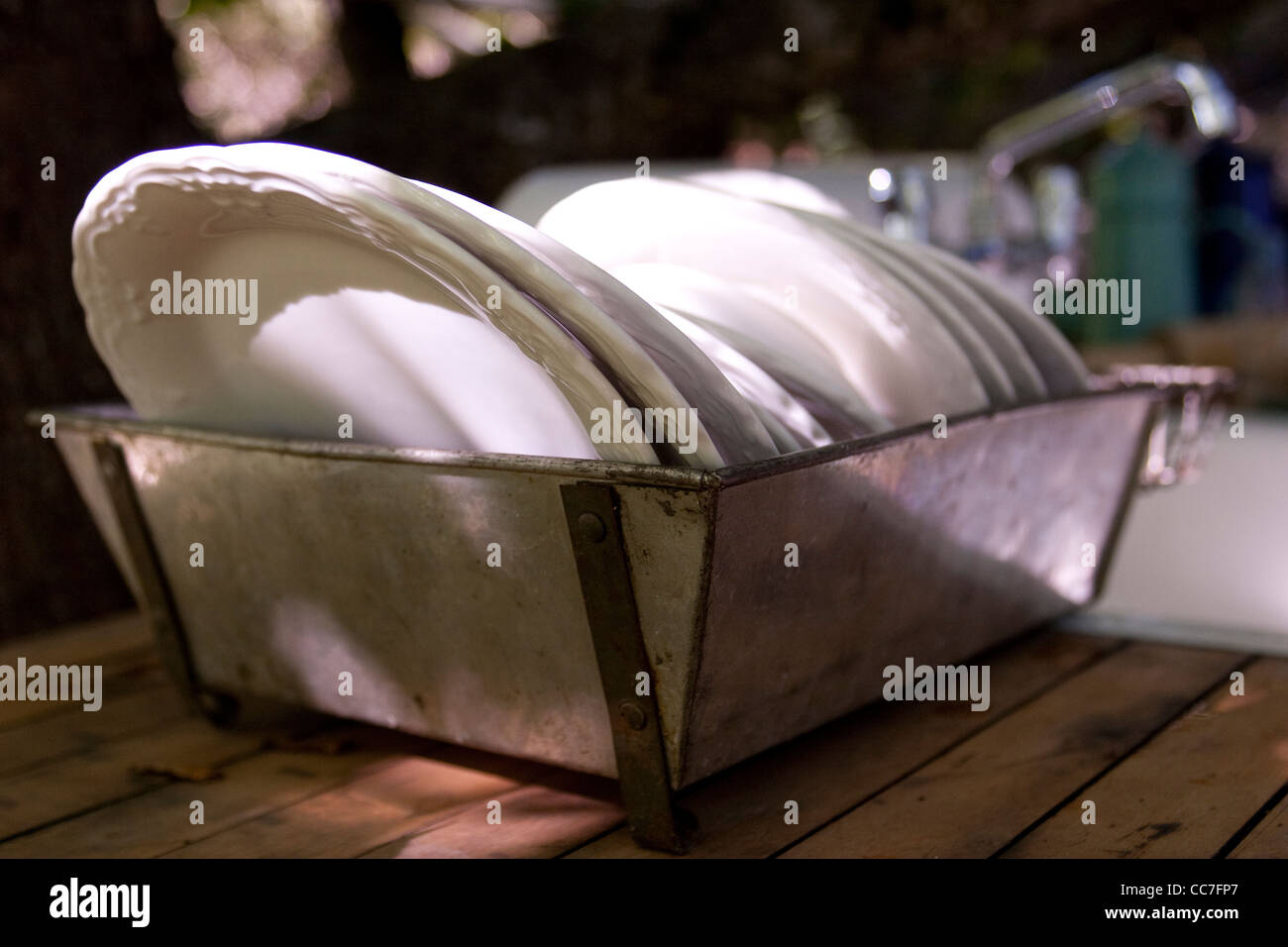 Plates drying in drainer Stock Photo - Alamy