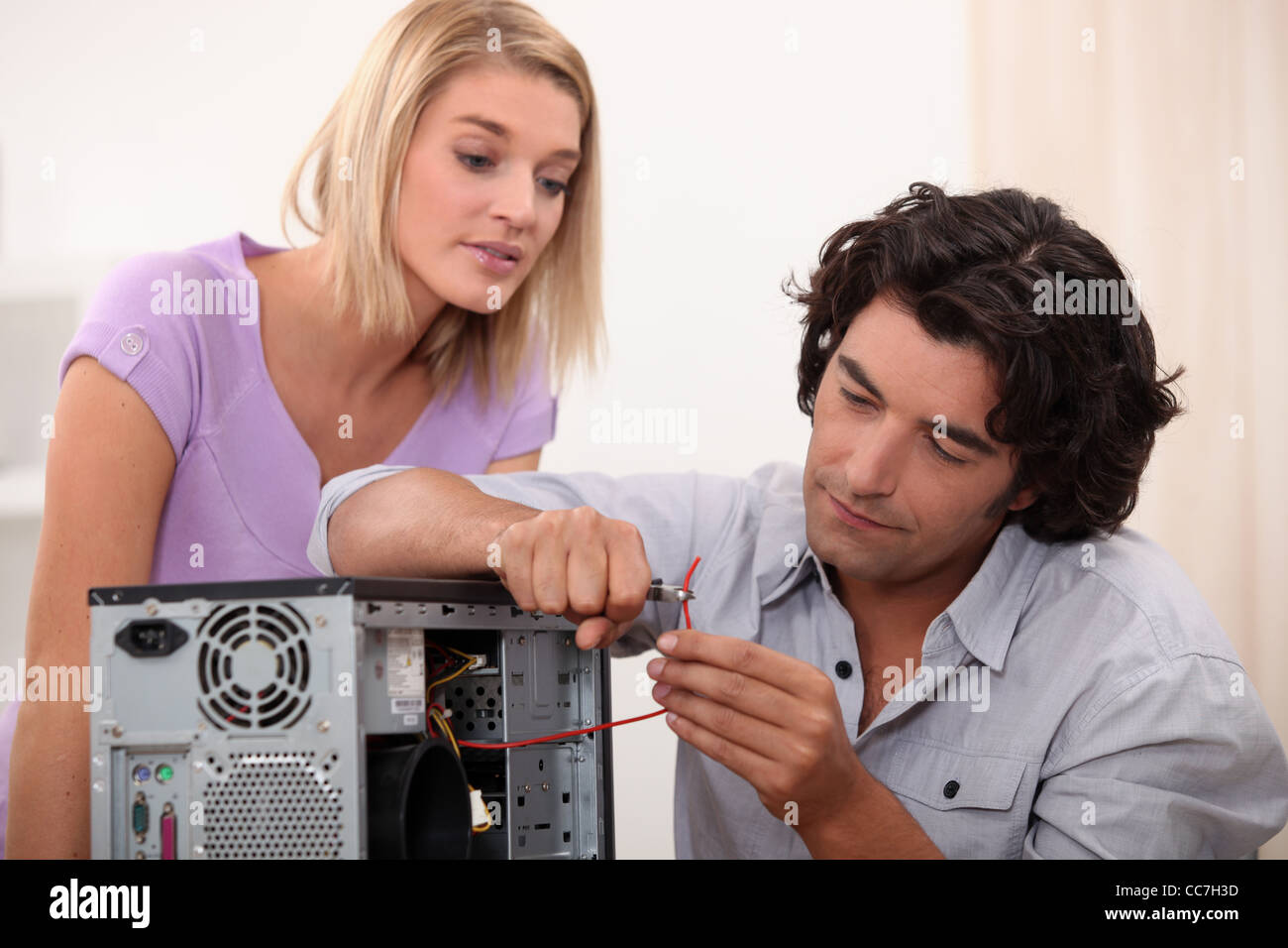 man repairing a computer Stock Photo - Alamy