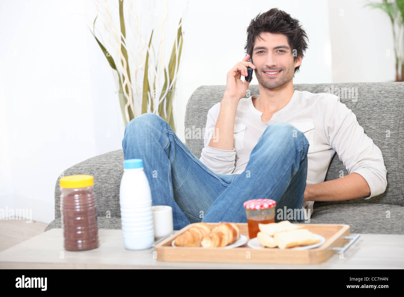 Man eating breakfast at home Stock Photo - Alamy