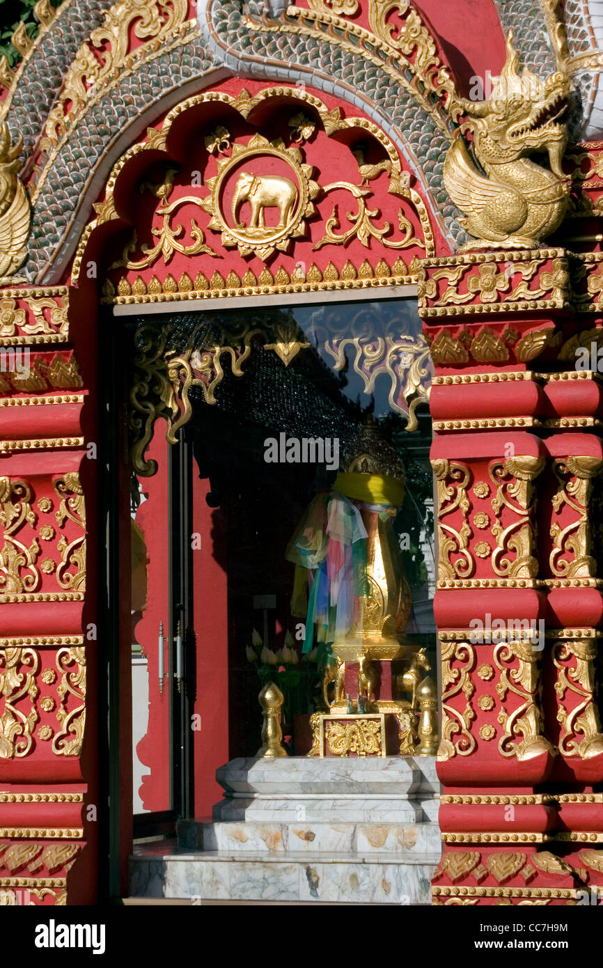 A beautiful altar is on display in a small pagoda at a Buddhist temple ...
