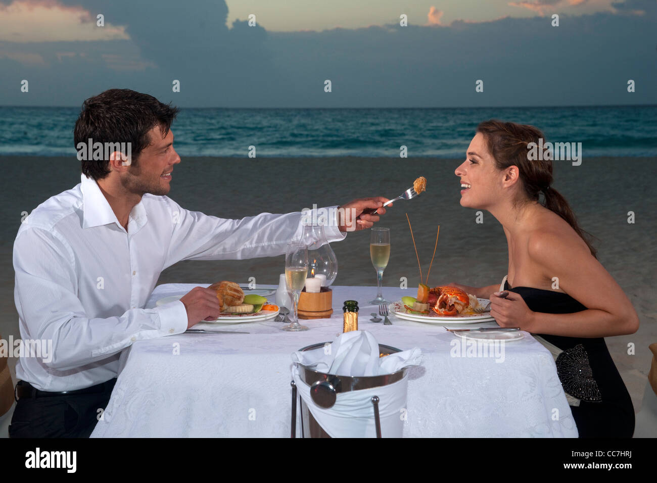 Couple Dining on Beach, Reef Playacar Resort and Spa, Playa del Carmen ...