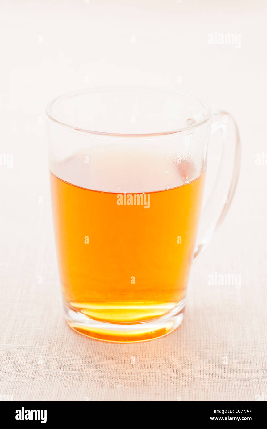 Glass cup with hot tea Stock Photo - Alamy