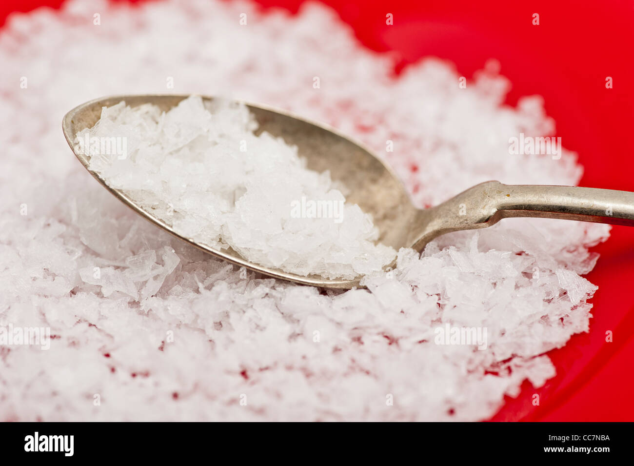 Salt and a spoon Stock Photo - Alamy