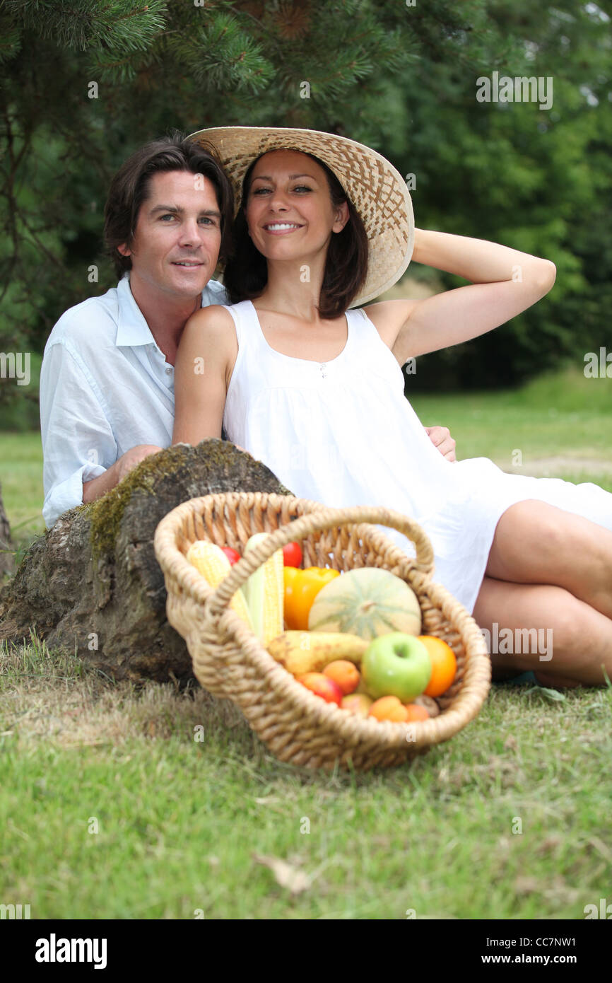 couple having a picnic Stock Photo - Alamy