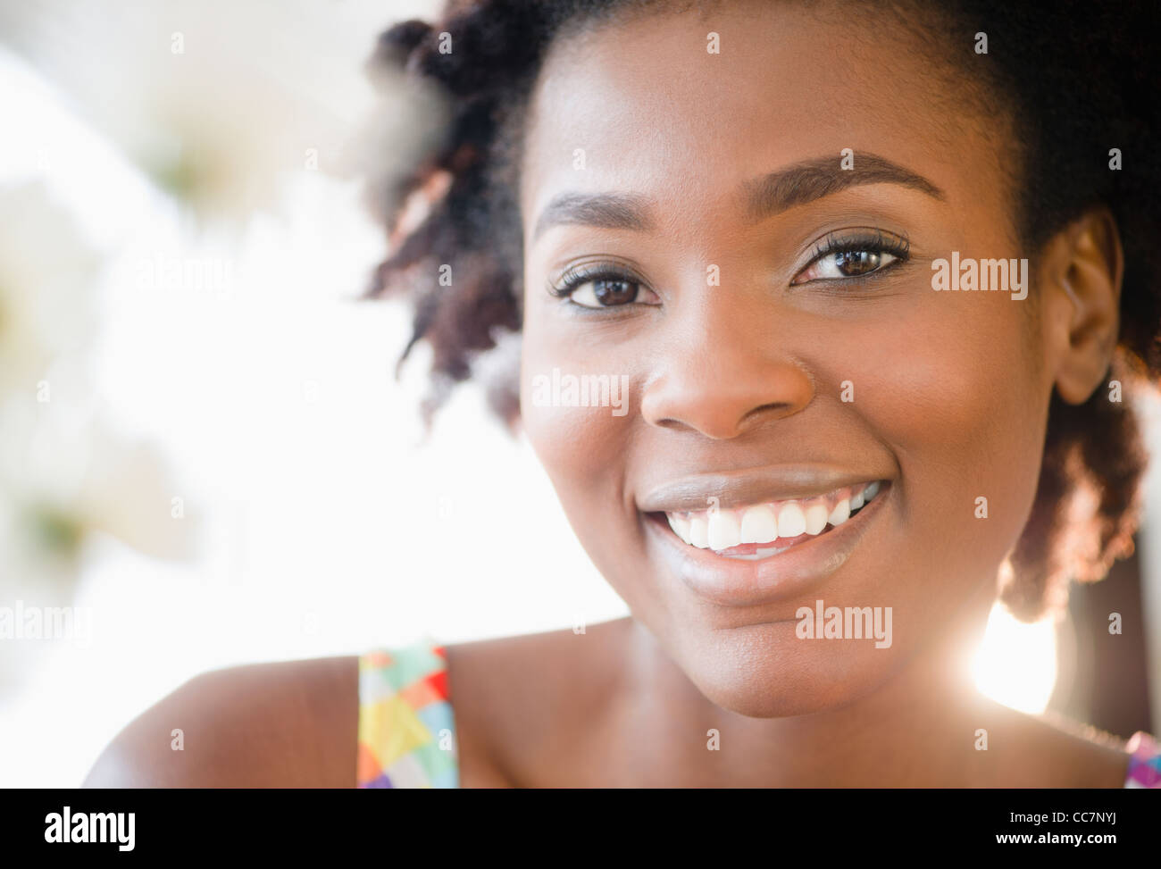 Smiling Black woman Stock Photo - Alamy