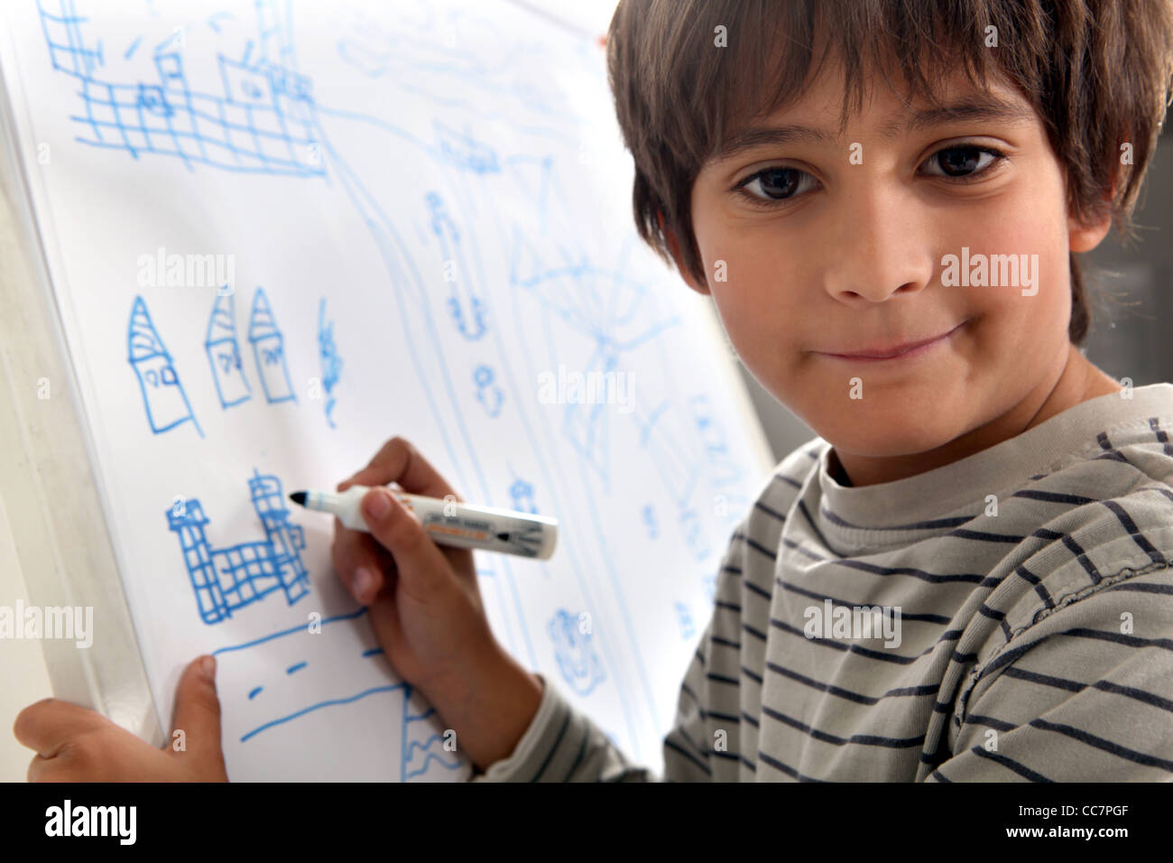 Little boy drawing Stock Photo - Alamy
