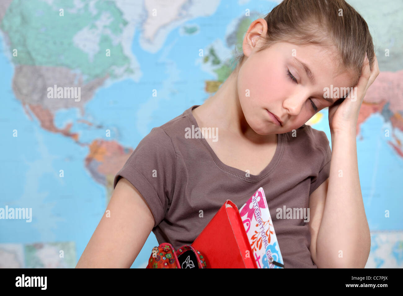 Bored girl falling asleep at school Stock Photo - Alamy