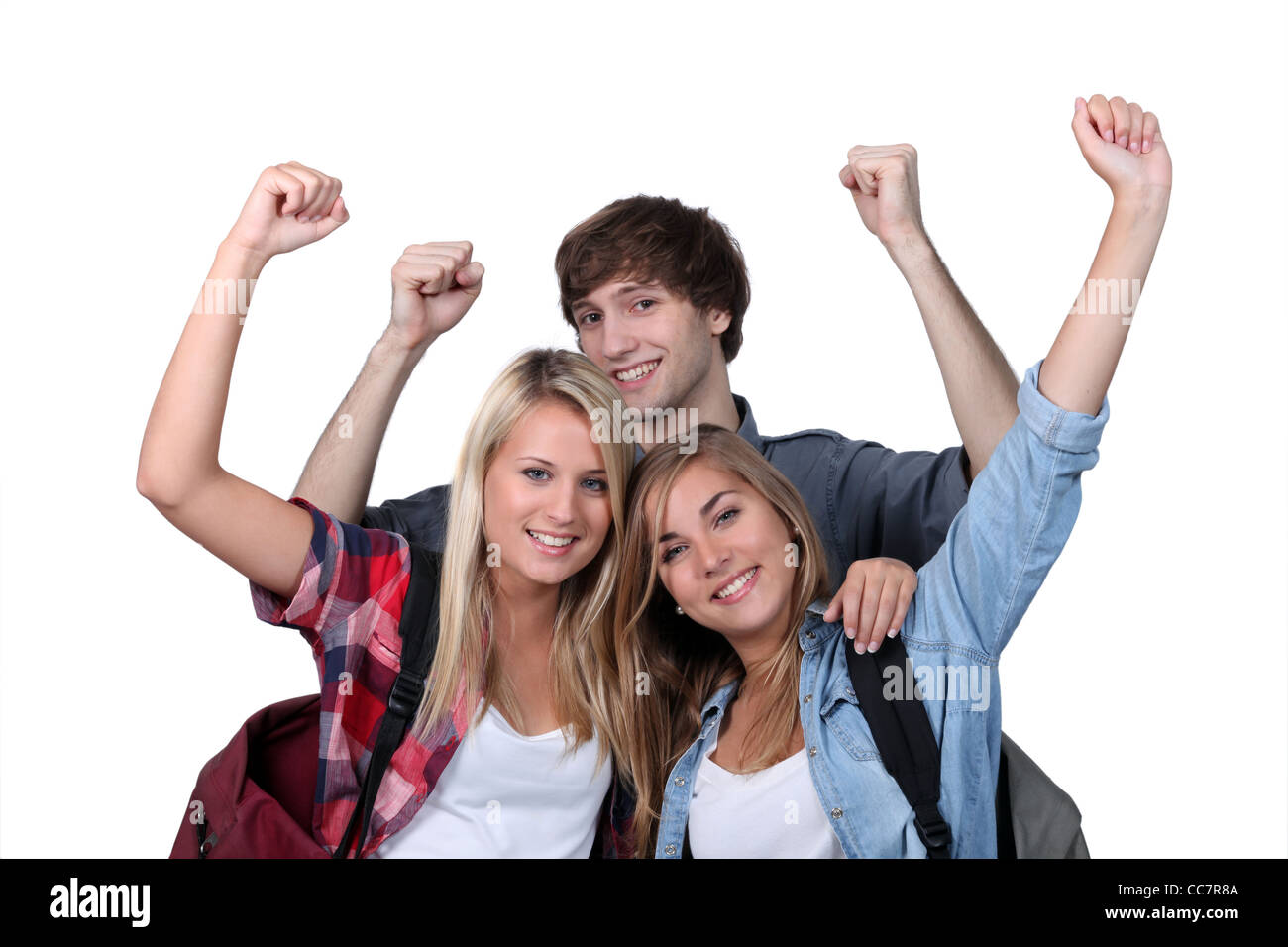 Three excited students Stock Photo - Alamy