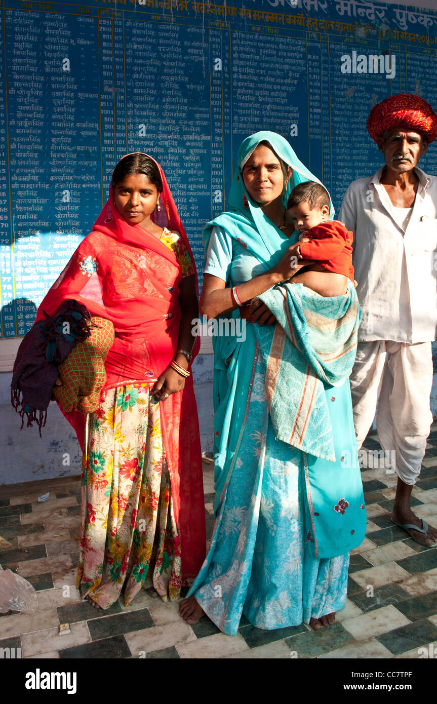 Family woman baby temple colour pushkar hi-res stock photography and ...