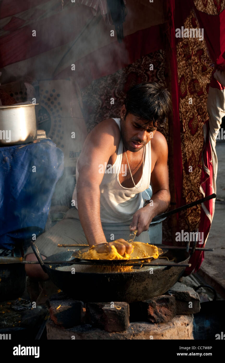 Indian man cooking street food hi-res stock photography and images - Alamy
