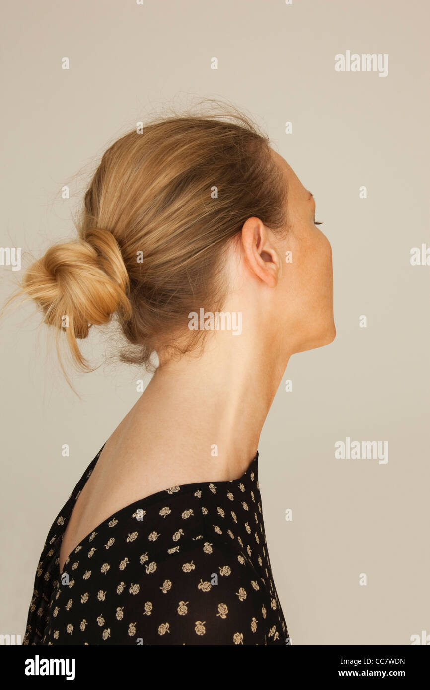 Woman with Hair in Bun Stock Photo - Alamy