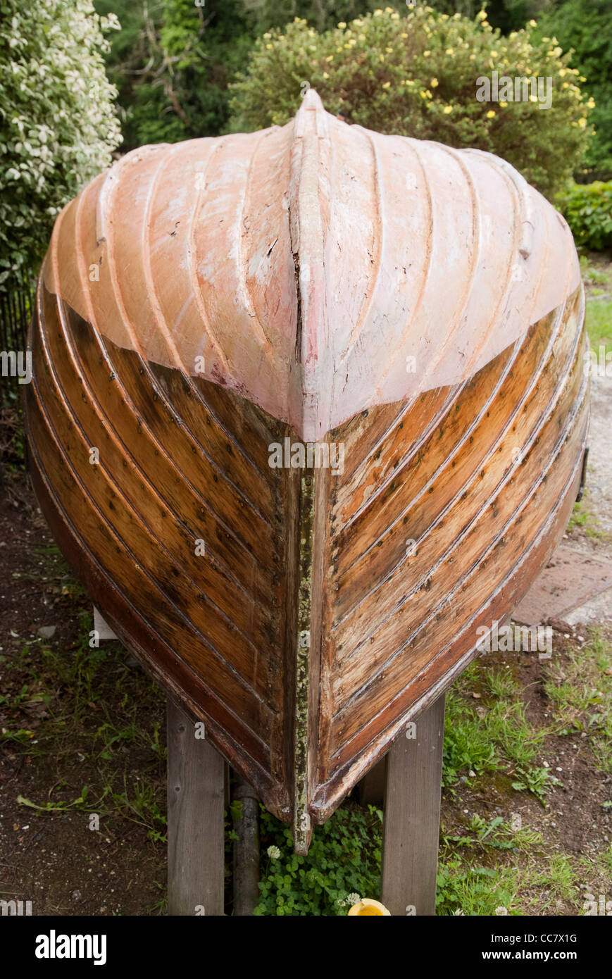 Wooden boat on dry land Stock Photo - Alamy