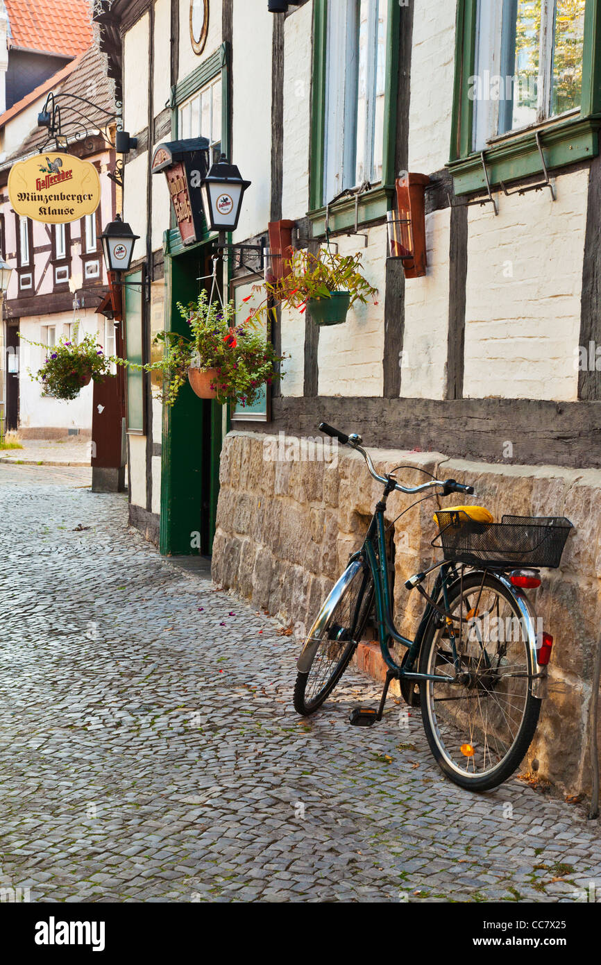 Bicycle in a cobbled street of half-timbered medieval houses in the ...