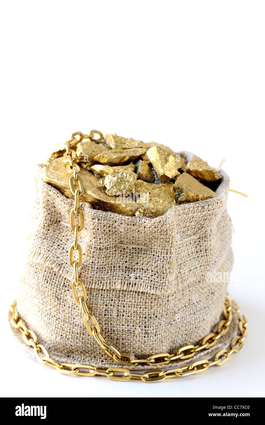 gold nuggets on a small pouch Stock Photo - Alamy