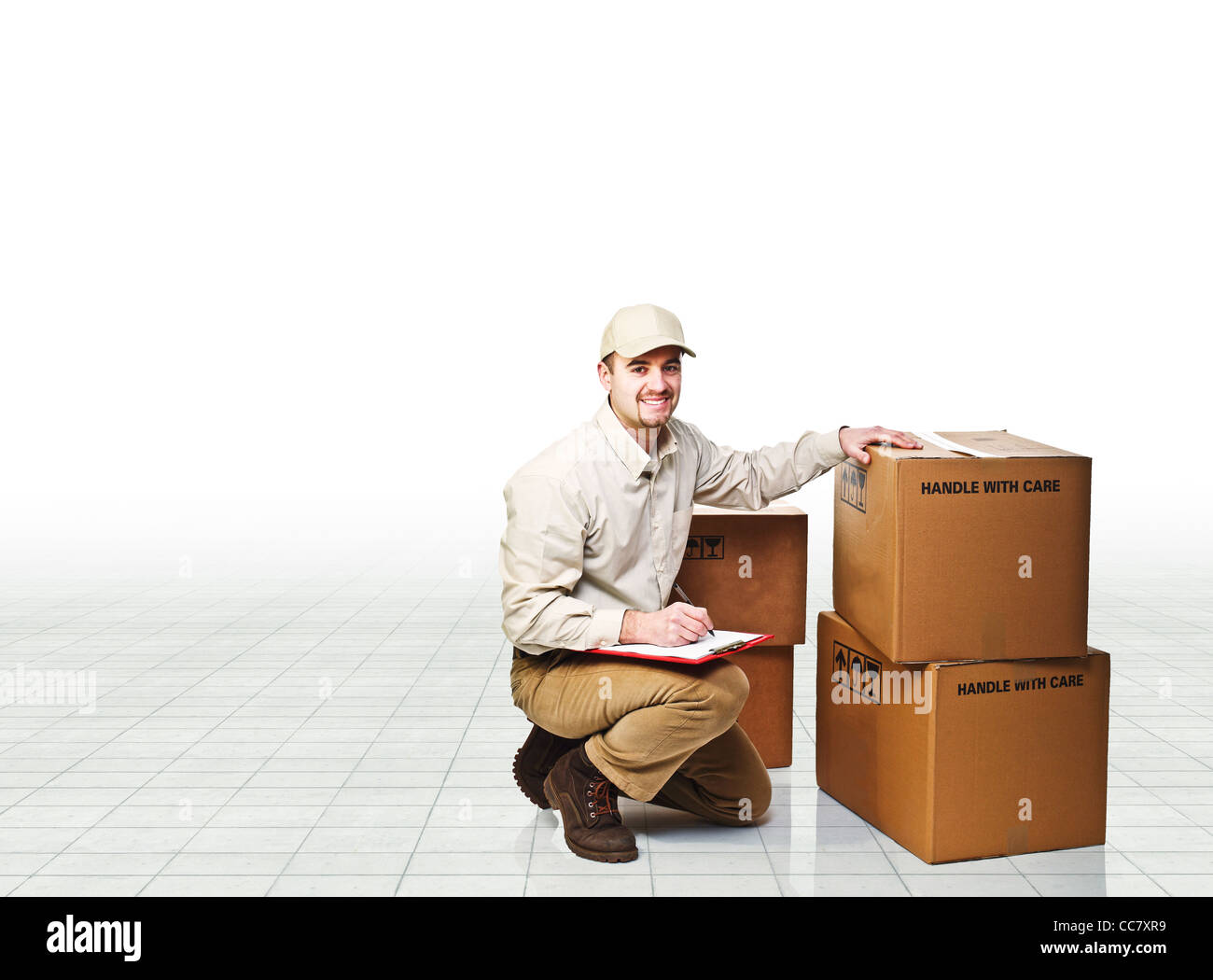 smiling delivery man at work Stock Photo - Alamy