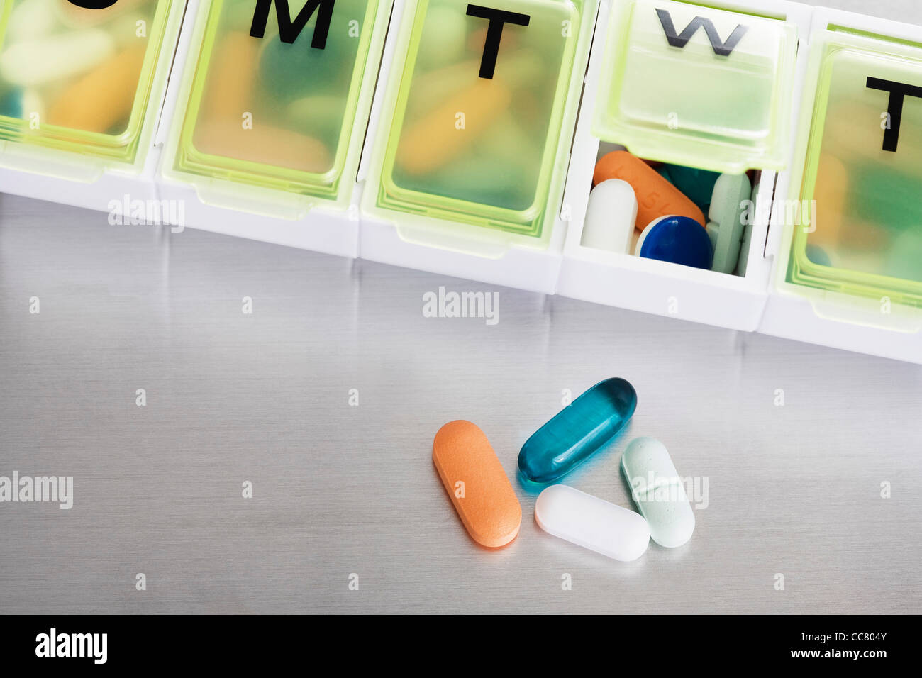 Pill Container and Pills Stock Photo - Alamy