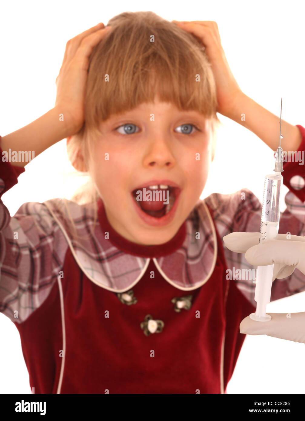 Emotion portrait of child and syringe Stock Photo - Alamy