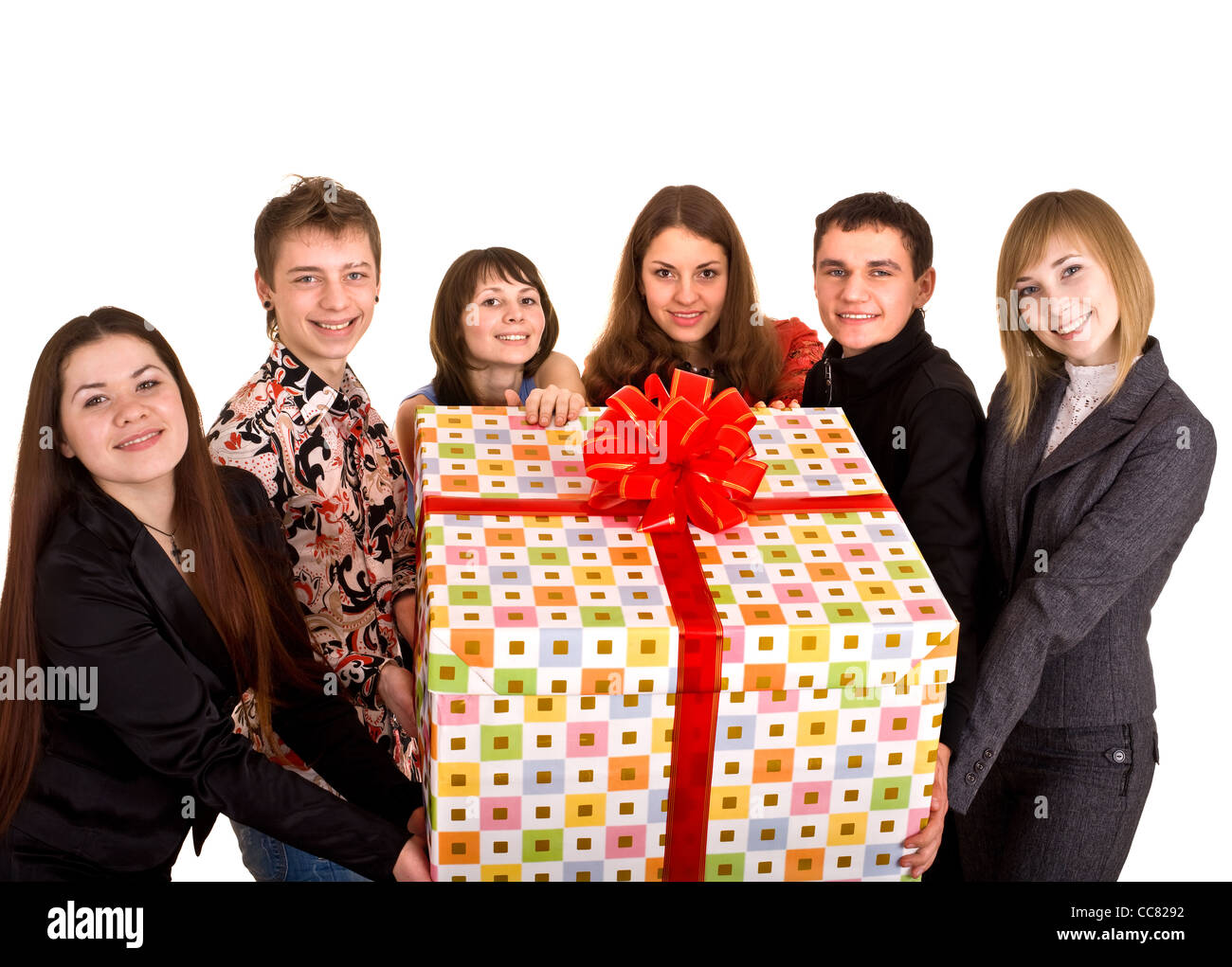 Group of people and big gift box Stock Photo - Alamy