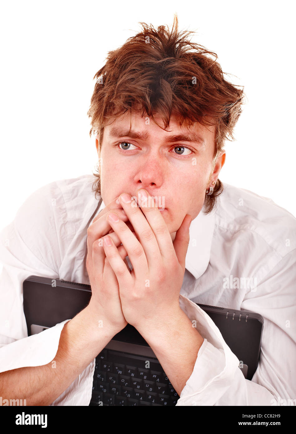 Businessman with laptop in crisis Stock Photo - Alamy