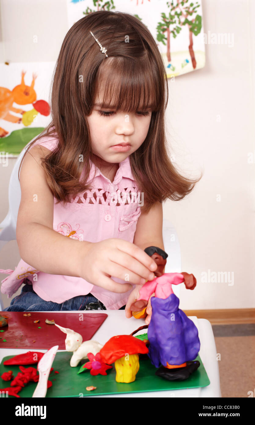 Child moulding of plasticine Stock Photo - Alamy