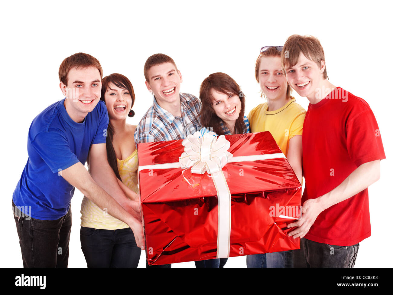 Group of people with big red gift box Stock Photo - Alamy