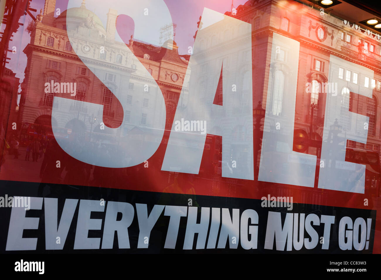 A Sale Everything Must Go poster in Lillywhites window and reflected ...