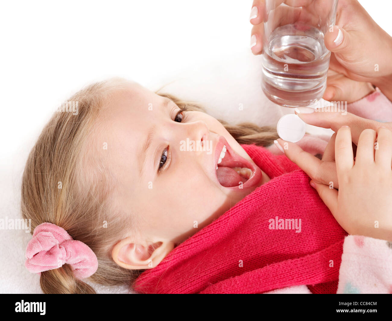 Sick child take medicine with doctor. Isolated Stock Photo - Alamy